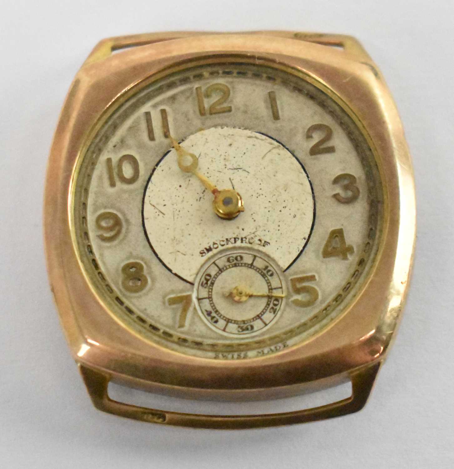 Lot 1454 - A 9ct yellow gold watch head, diameter of