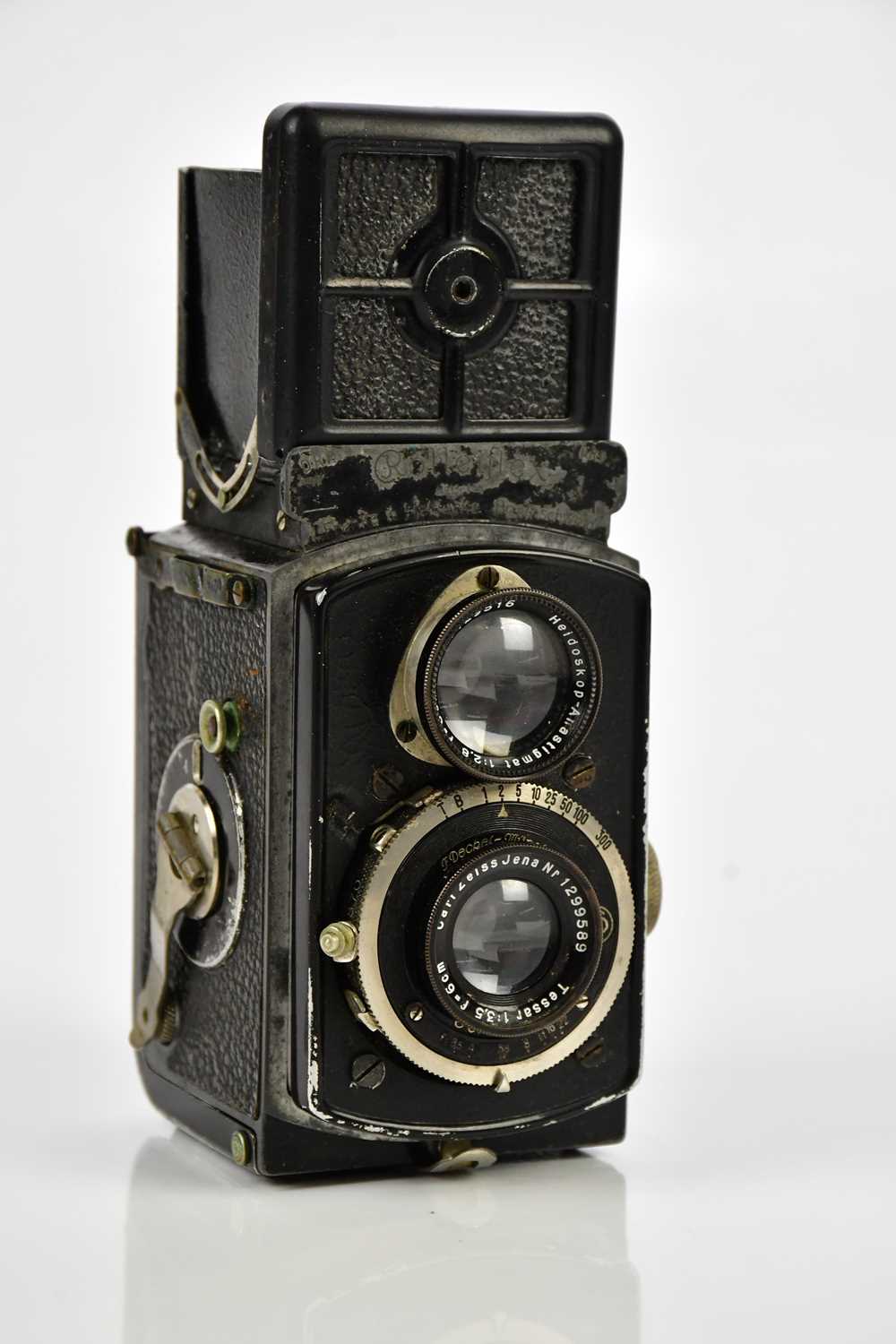 Lot 433 - ROLLEIFLEX; a Rolleiflex Baby 4x4 TLR camera,