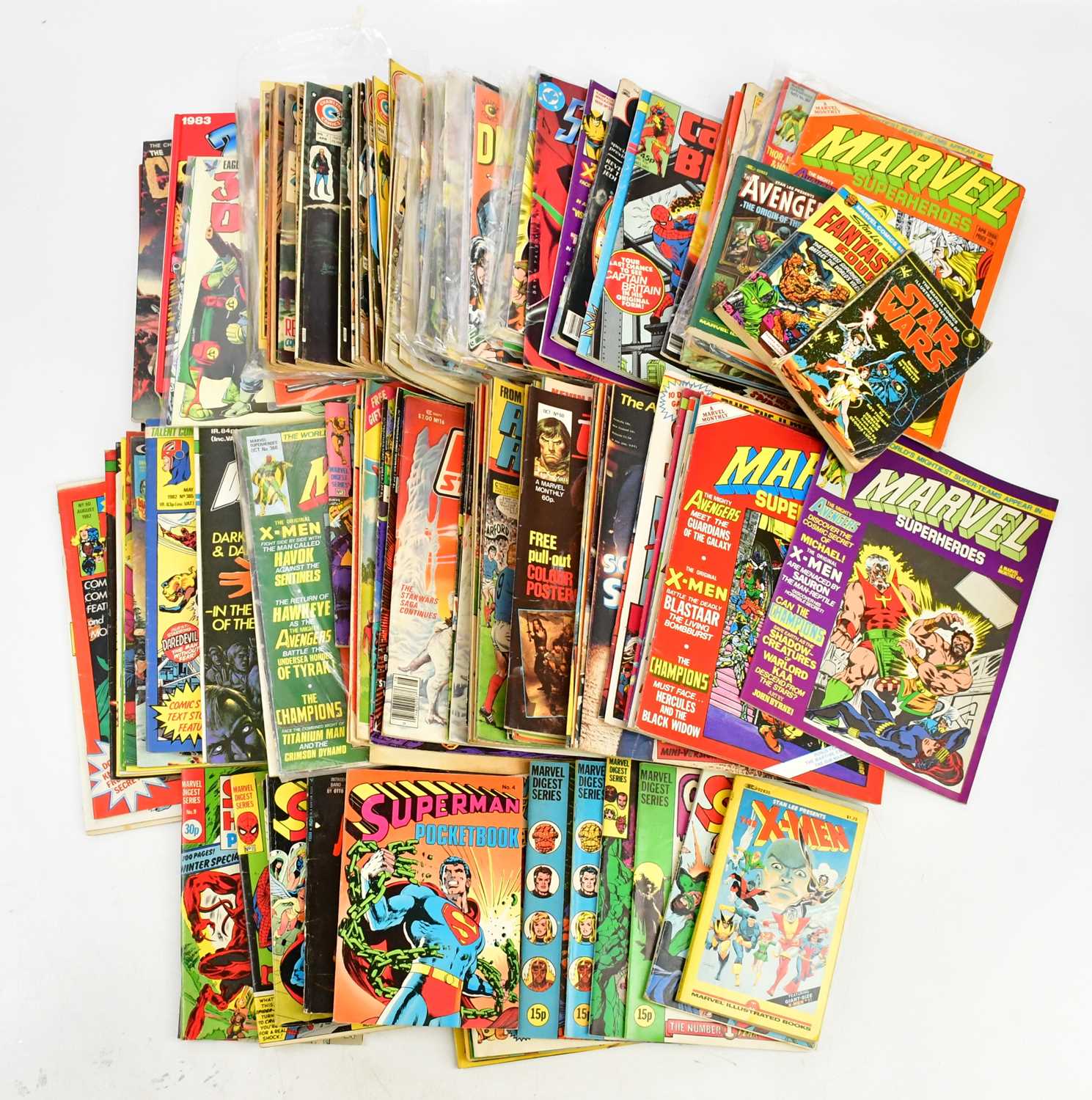 Lot 618 - A collection of various comics and magazines