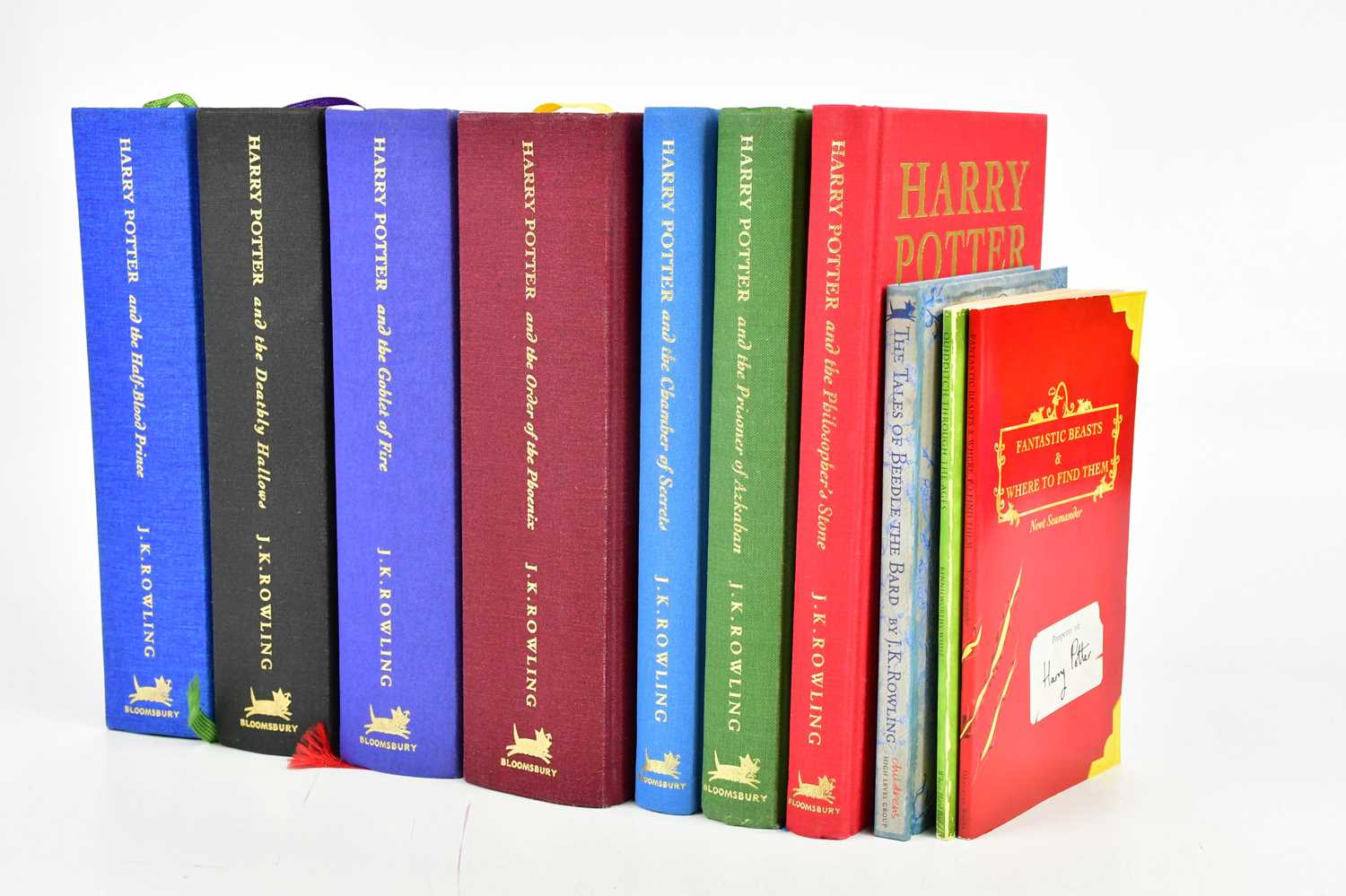Lot 1836 - ROWLING (J.K); a set of seven Harry Potter