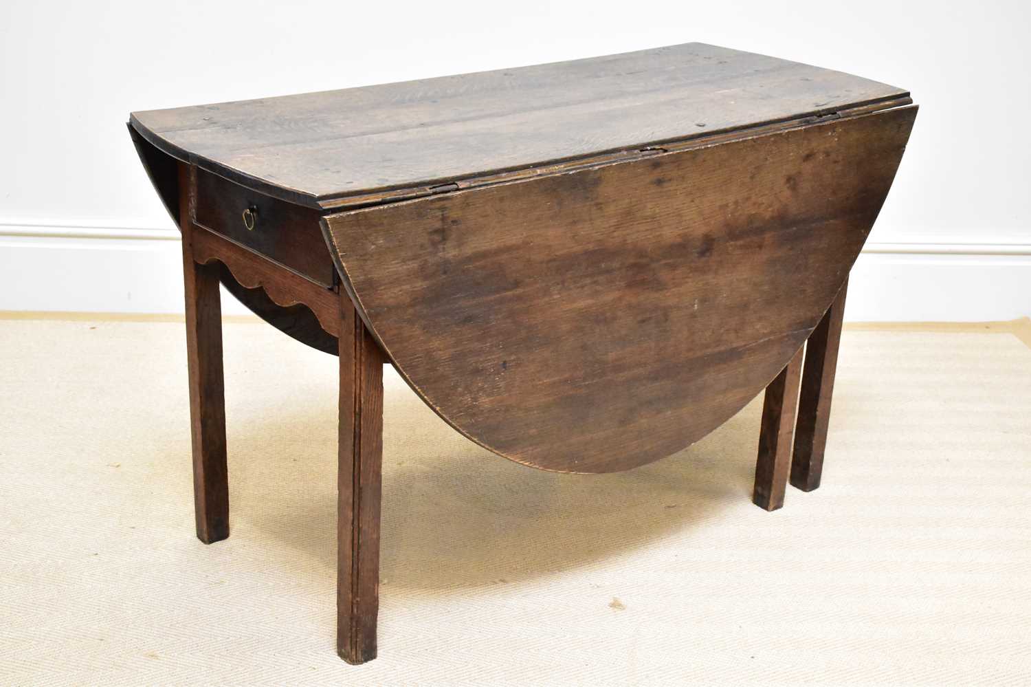 Lot 1298 - A 19th century oak gateleg table on square