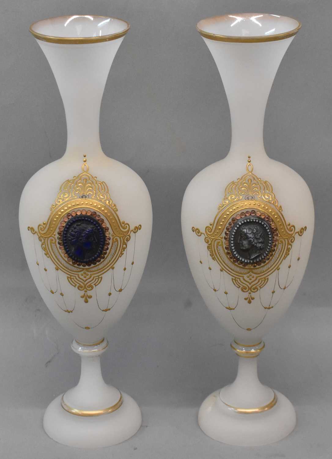 Lot 608 - A pair of Victorian opaque glass vases each