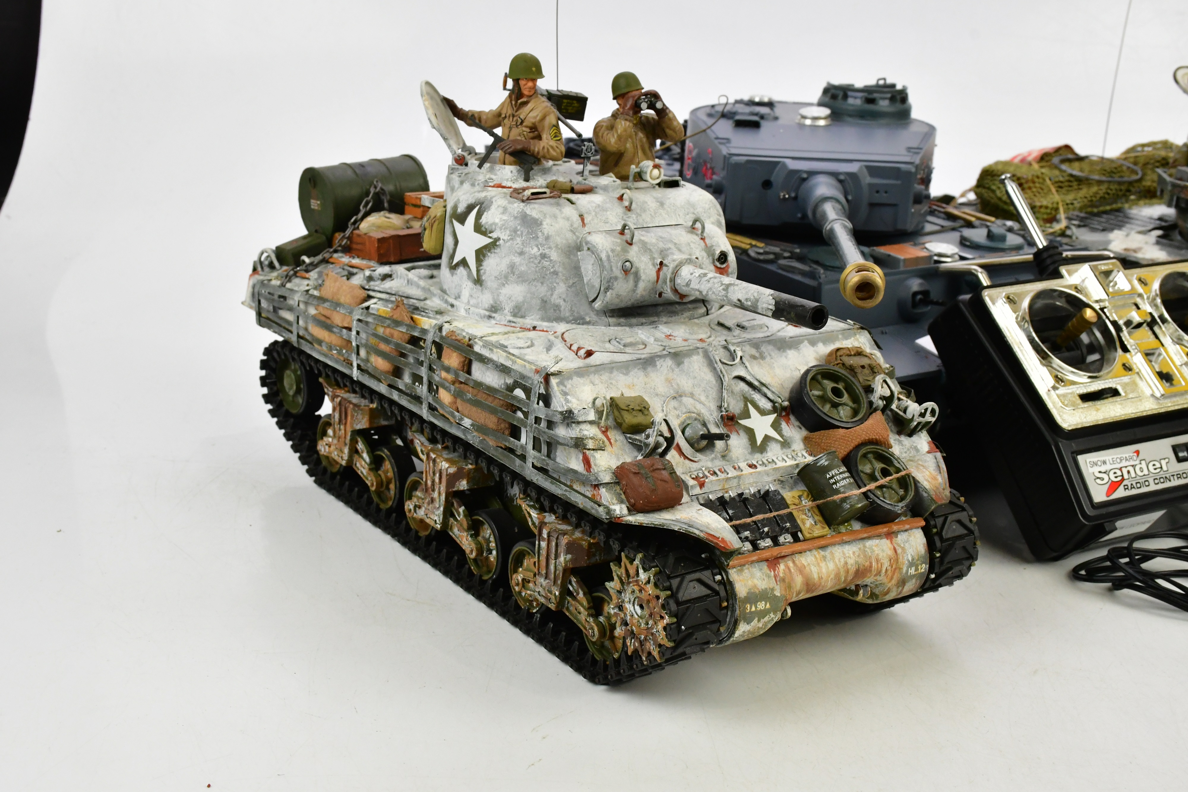 Lot 222 - Three radio controlled tanks, two lacking