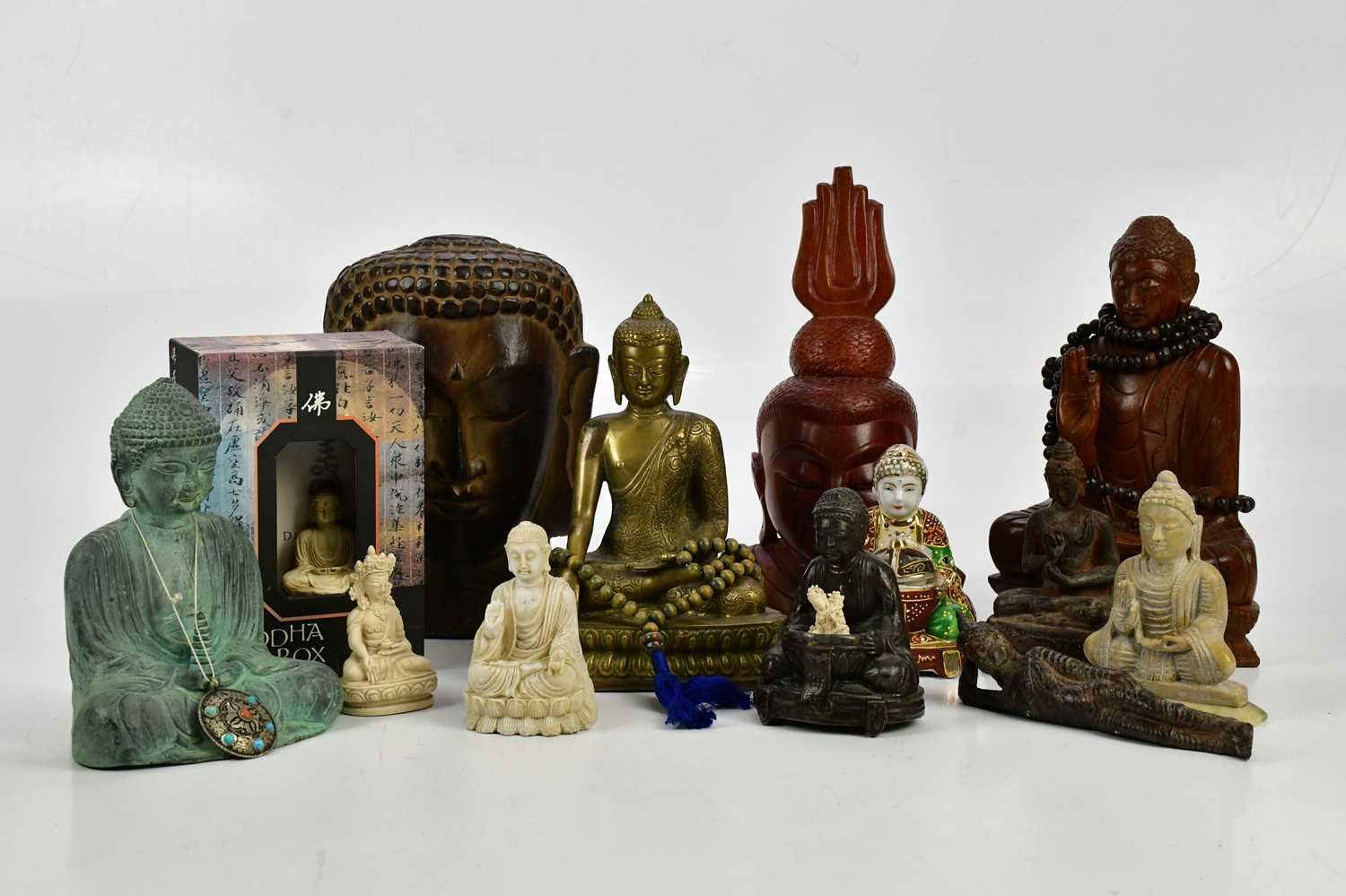 Lot 2715 - A collection of Buddha figures including