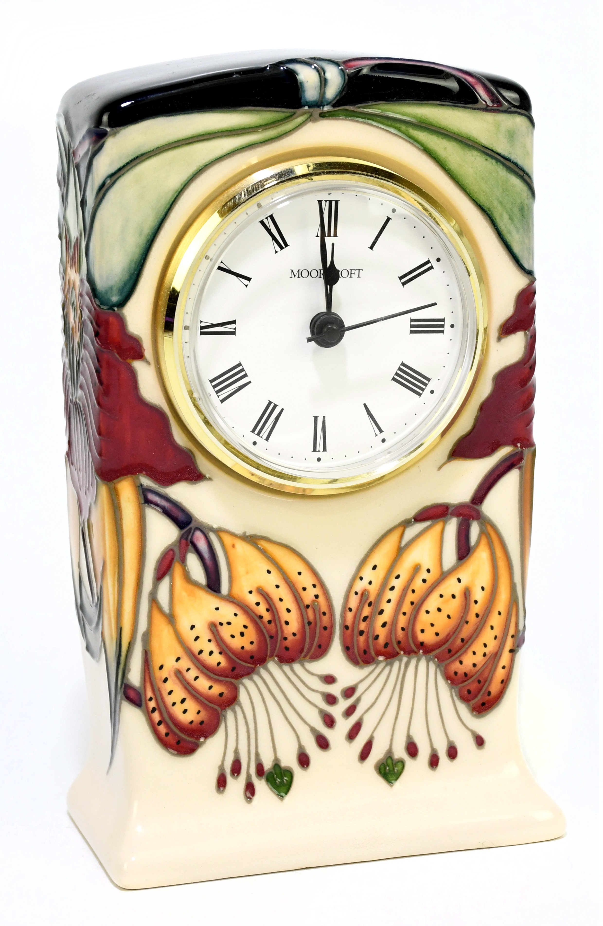 Lot 99 - NICOLA SLANEY FOR MOORCROFT; a mantel clock