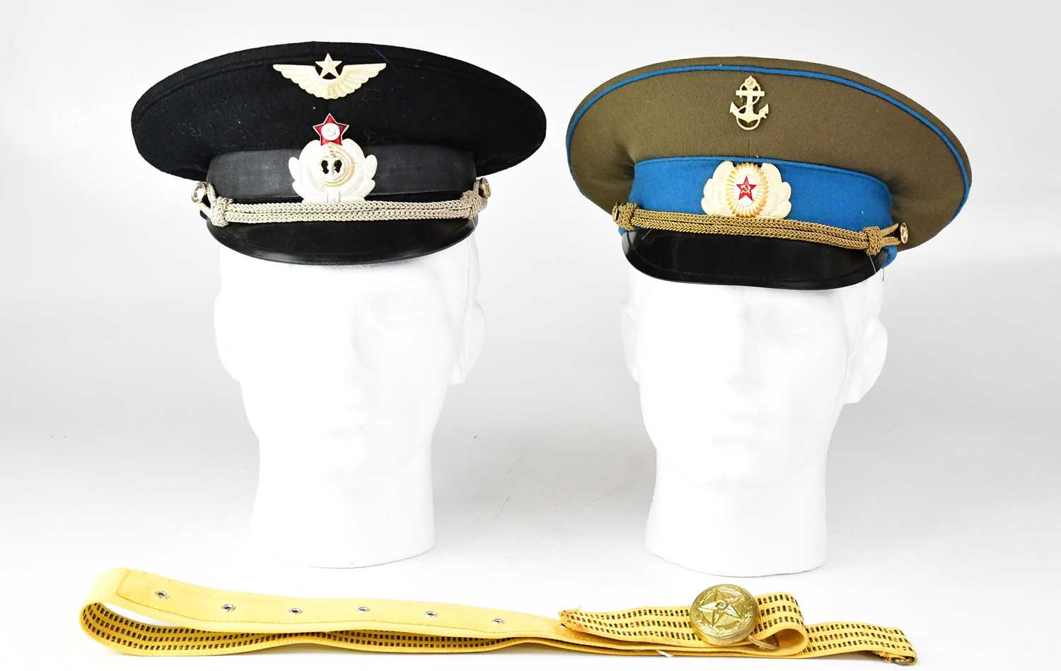 Lot 280 - Two Soviet era Navy peaked caps, and a belt