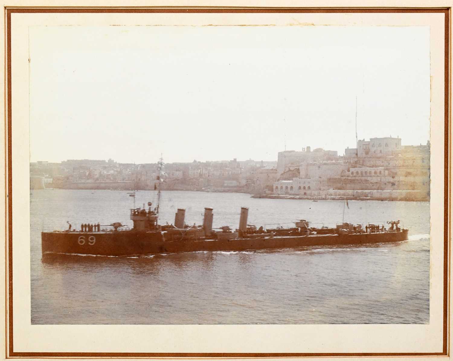 Lot 437 - A pair of Naval photographs, one the crew of