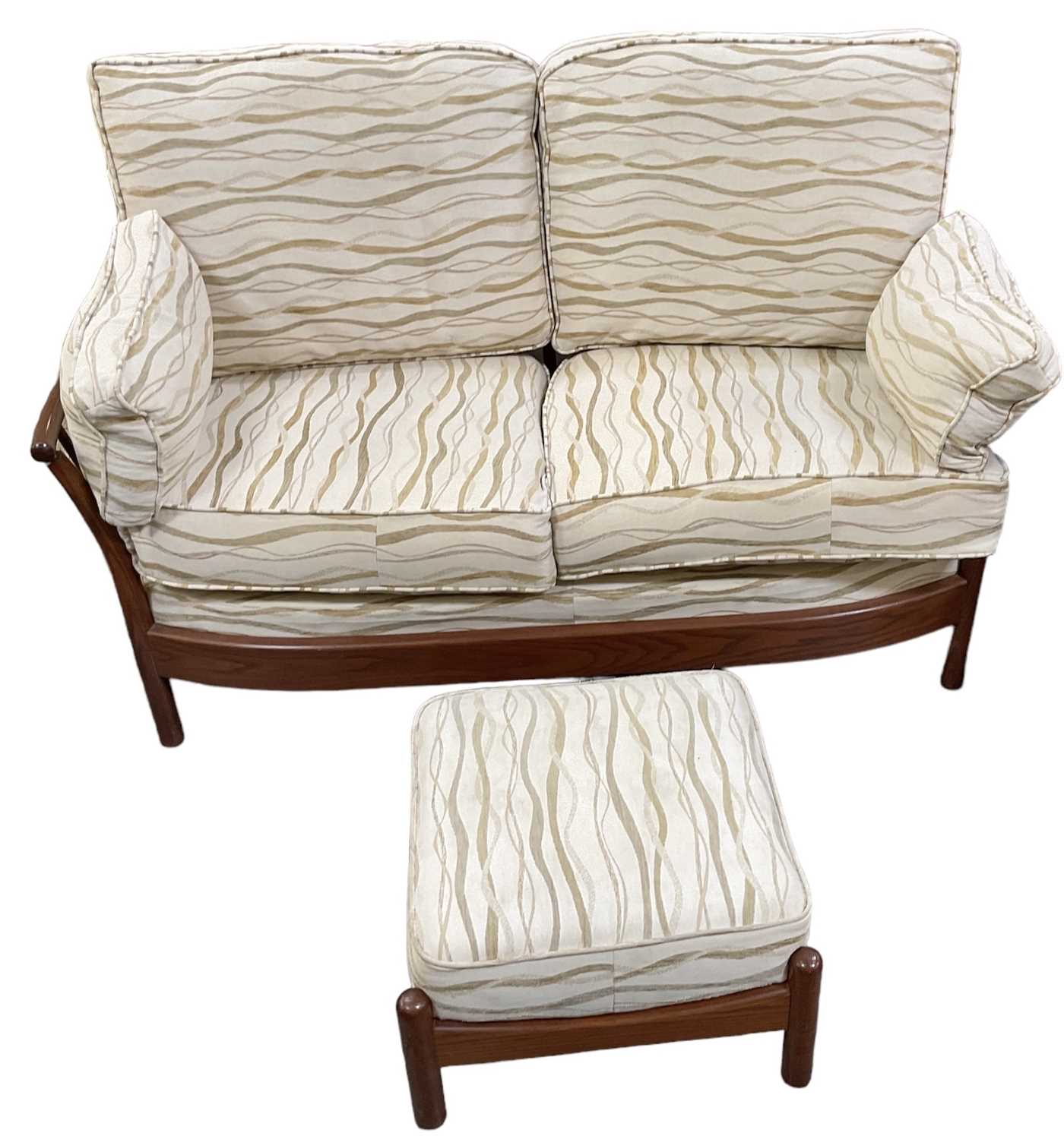 Lot 34 - ERCOL; a mid century elm two seater stick