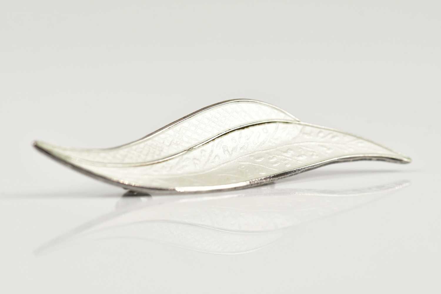 Lot 391 - KARL RASMUSSEN; a sterling silver and white
