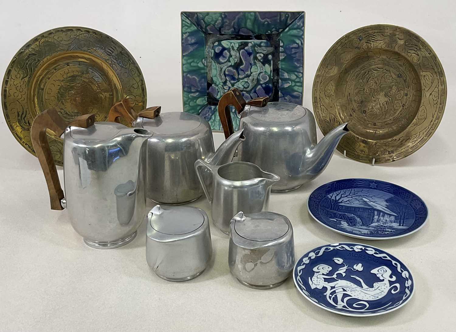 Lot 99 - A six piece Picquot ware tea set, a pair of