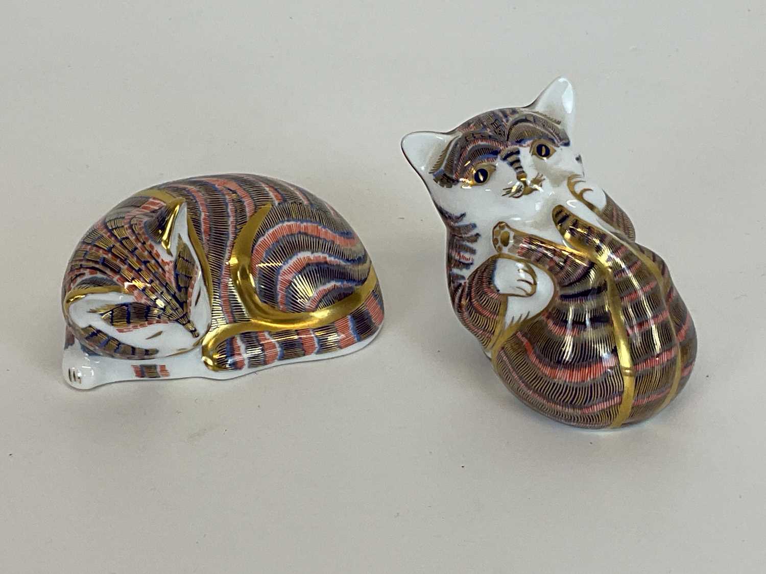 Lot 234 - ROYAL CROWN DERBY; two paperweights modelled