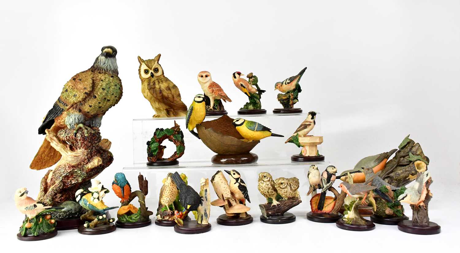 Lot 342 - A collection of bird figures, mainly resin