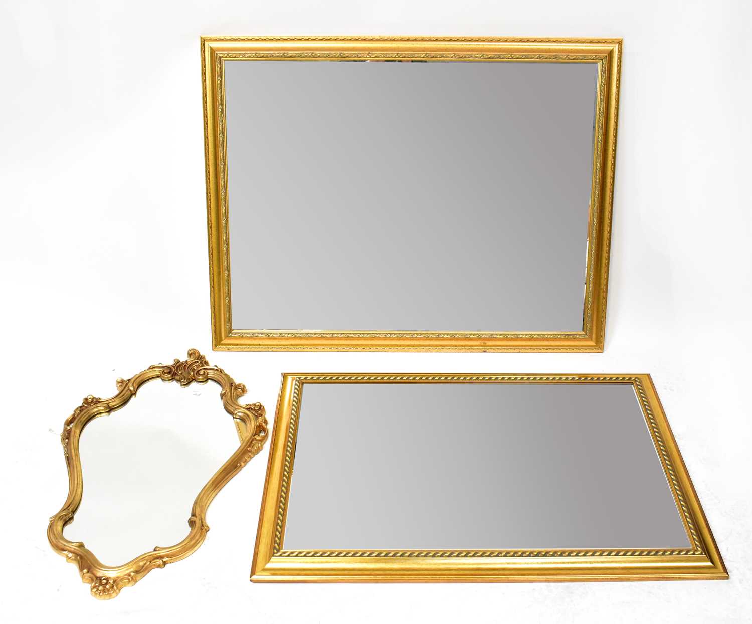 Lot 95 - Two rectangular gilt framed wall mirrors and