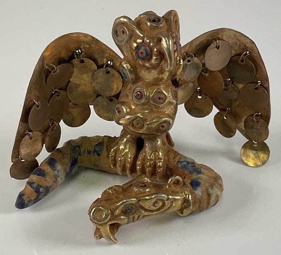 Lot 1025 - A South American Inca inspired yellow metal