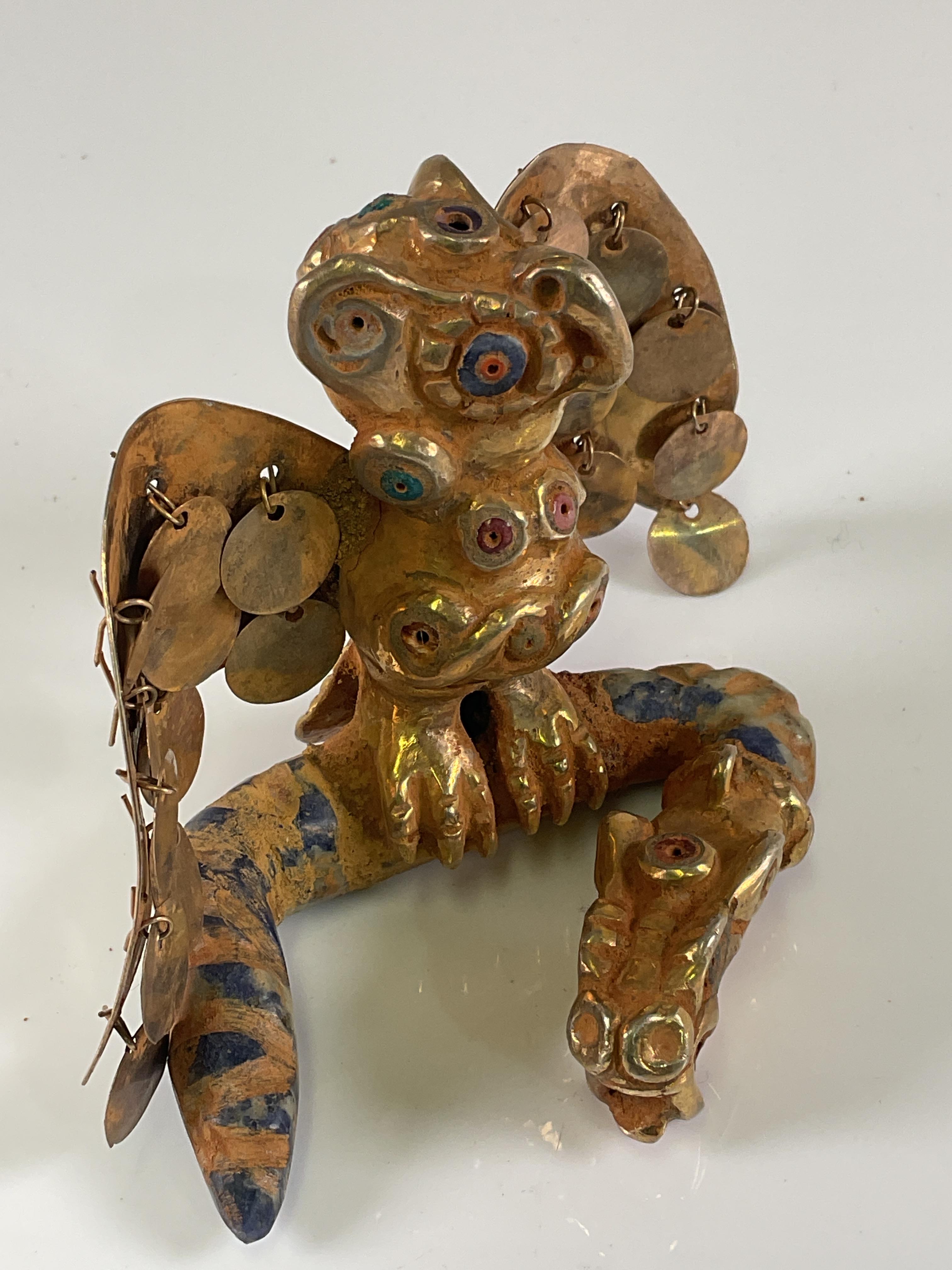 Lot 1025 - A South American Inca inspired yellow metal