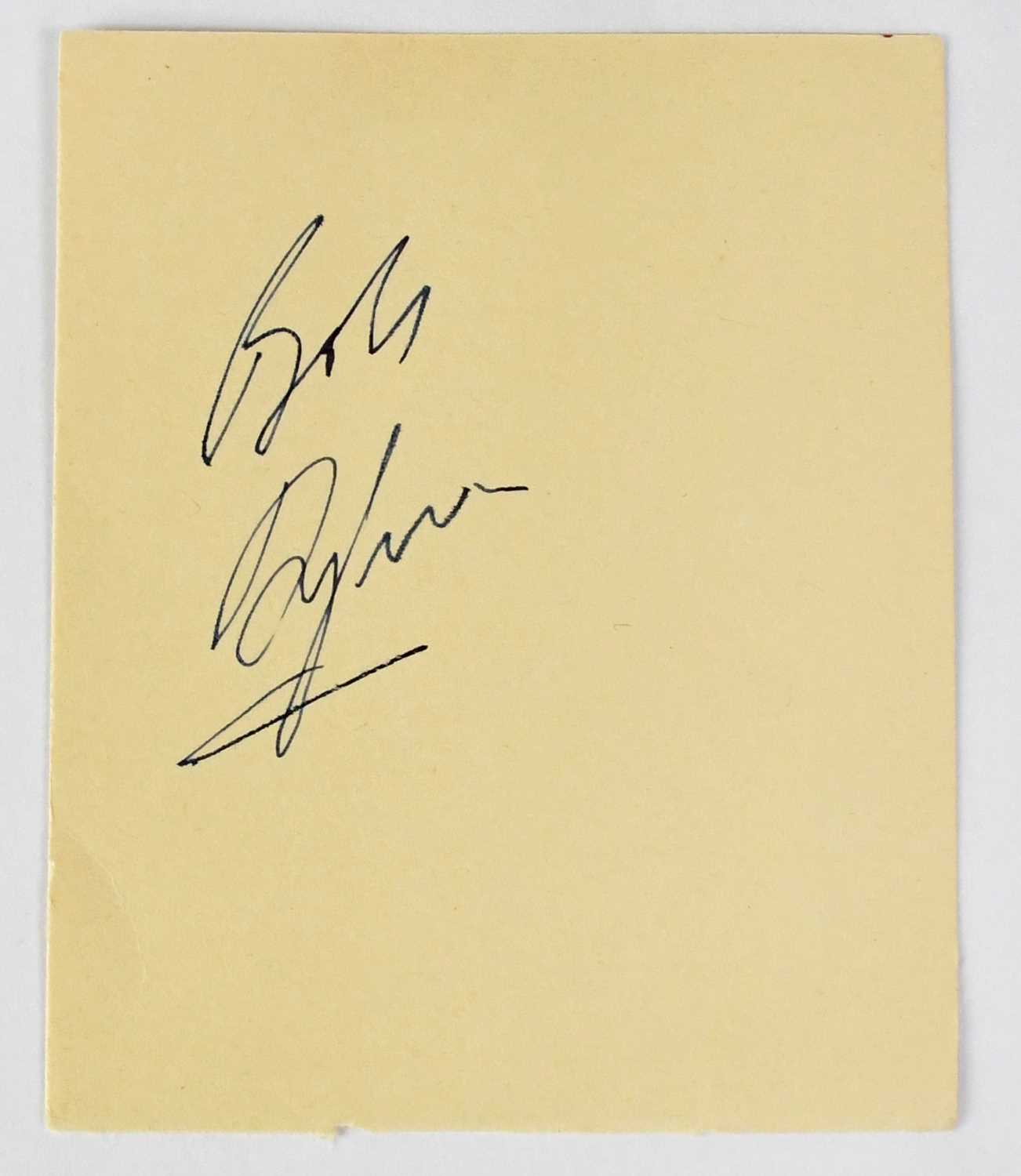 Lot 274 - BOB DYLAN; a torn page from an autograph