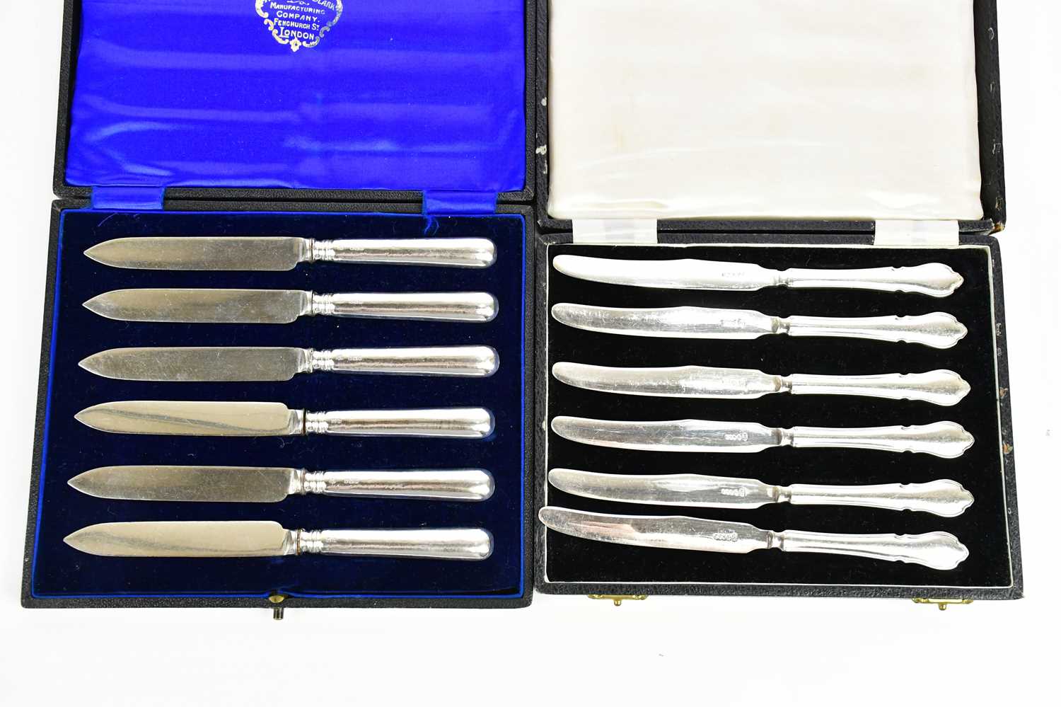 Lot 577 - A cased set of silver handled tea knives and