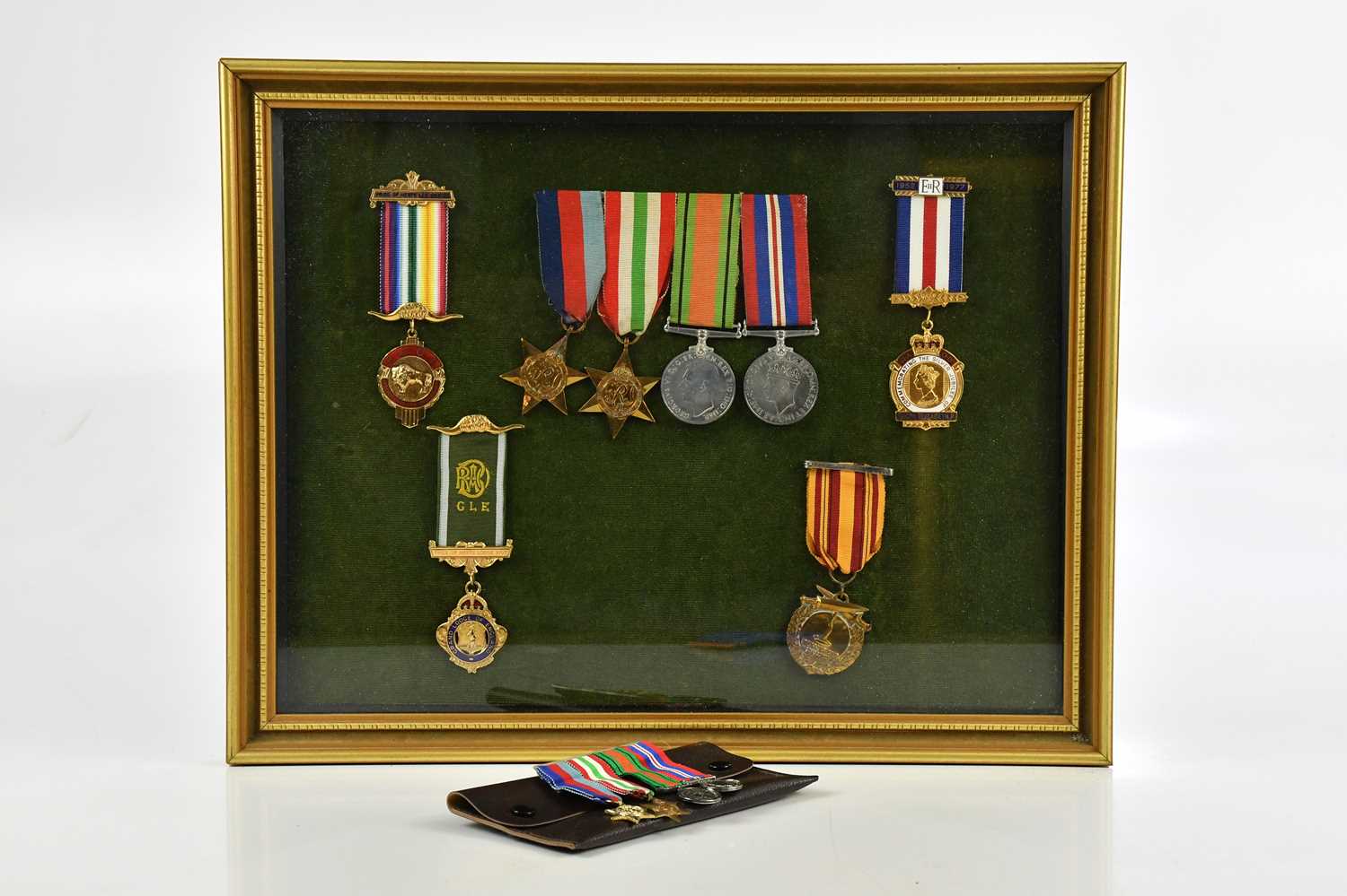 Lot 214 - A framed collection of WWII medals including