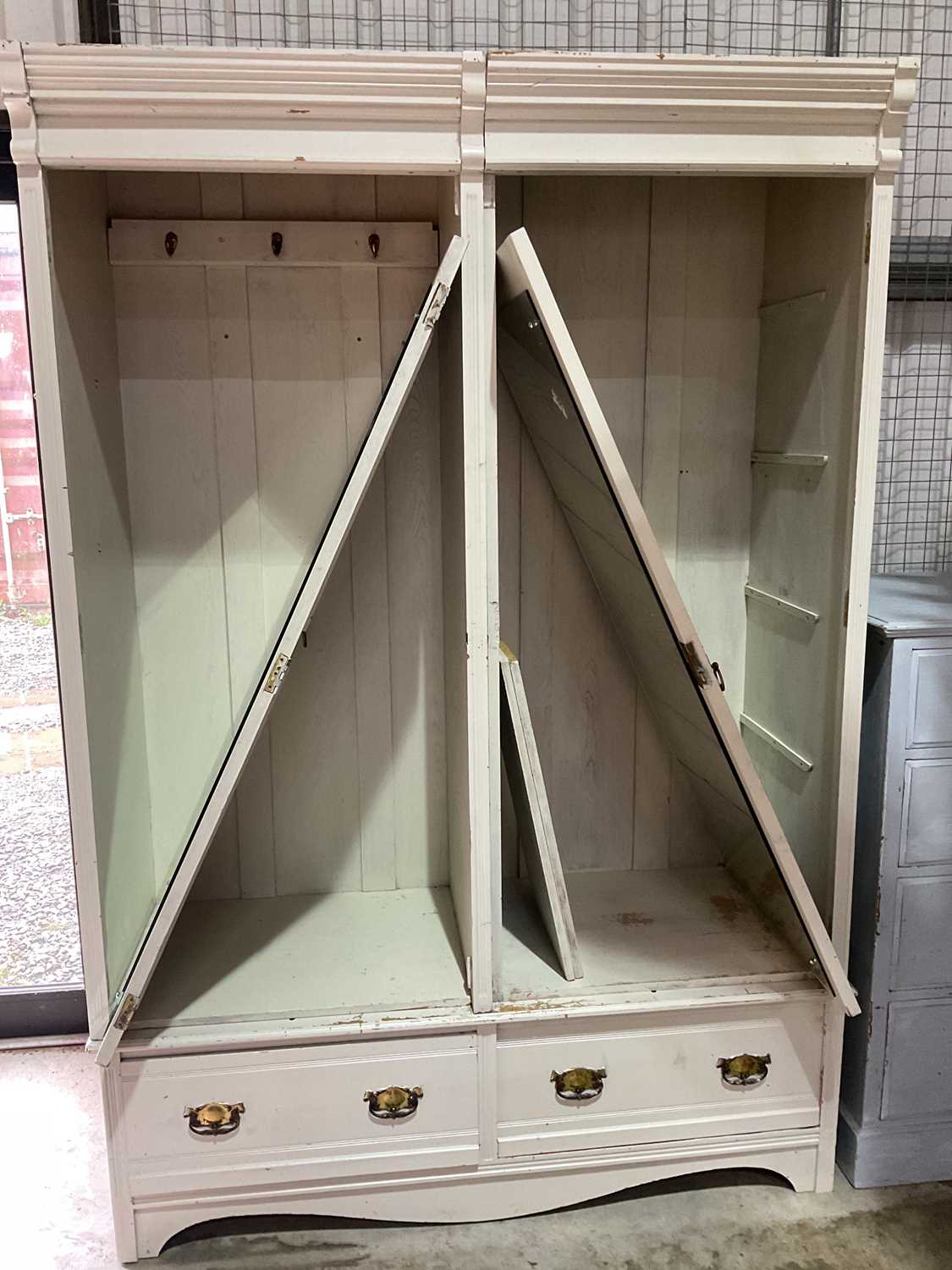 Lot 836 - A painted ash wardrobe, with two drawers to