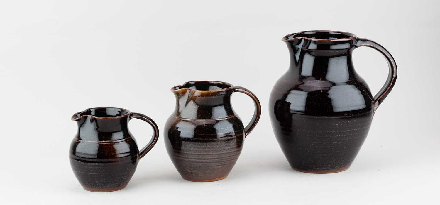 Lot 545 - Winchcombe Pottery; a graduated trio of