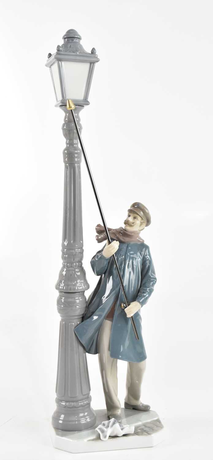 Lot 472 - LLADRÓ; a large model of 'The Lamplighter',