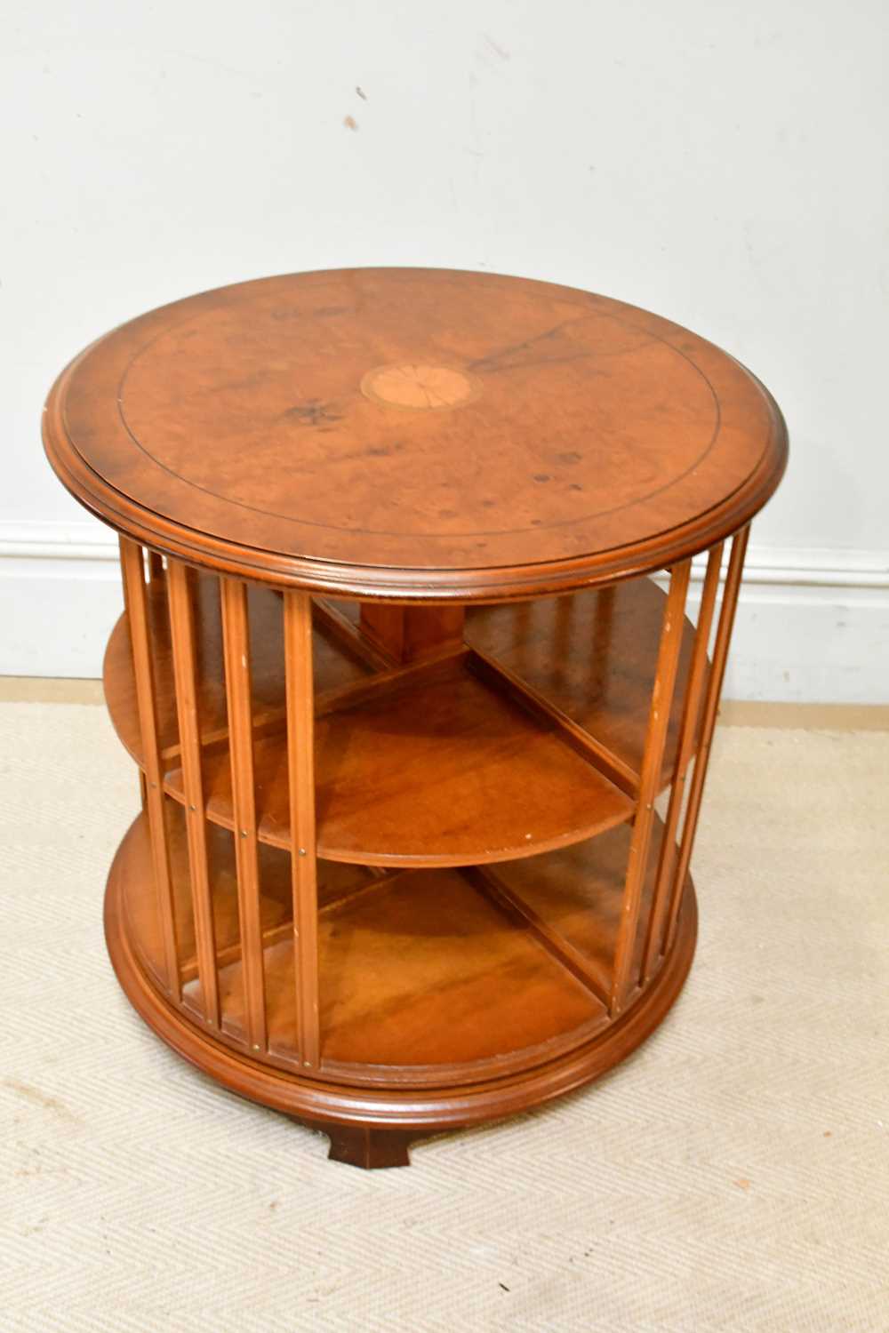 Lot 23 - A reproduction yew wood revolving cylindrical